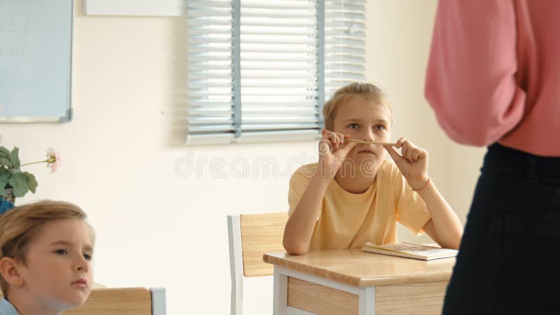 Caucasian Smart Student Listening Teacher Explaining about Classwork ...