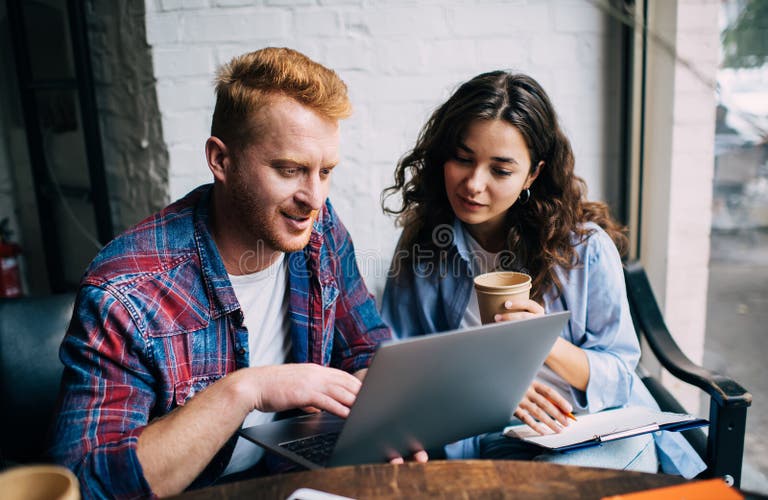 Caucasian Software Developers Analyzing Program Data Code during ...