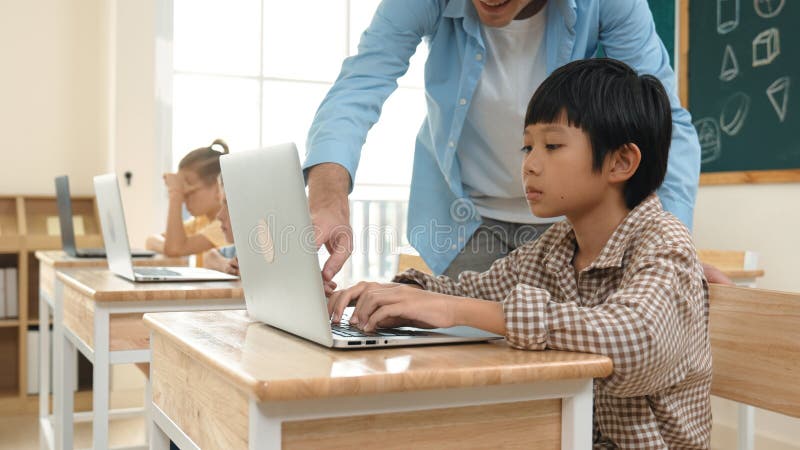 Caucasian Teacher Helping Asian Student Coding Engineering Prompt ...