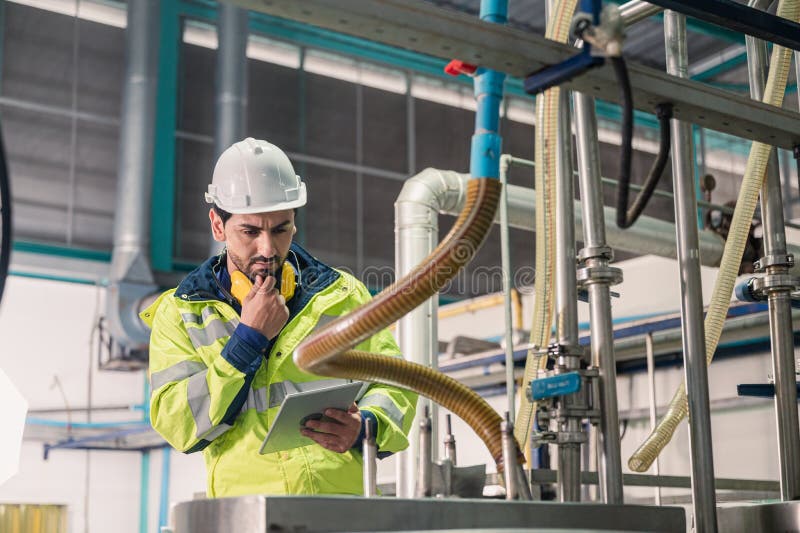 Caucasian Technician Engineer Man in Uniform with Tablet Checking and ...