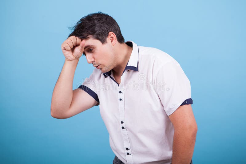 Caucasian Thinking about a Dilema with Hand on His Forehead Stock Photo ...