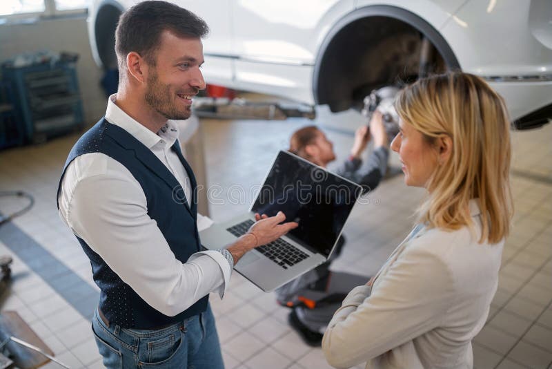 Caucasian Woman Getting Her Car Fixed Stock Photo - Image of ...