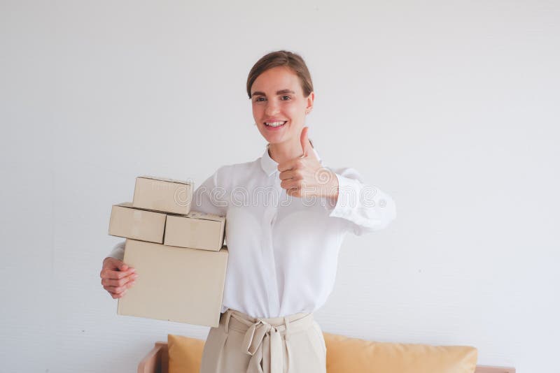 Woman Holding a Carton Boxes Stock Image - Image of person, caucasian ...