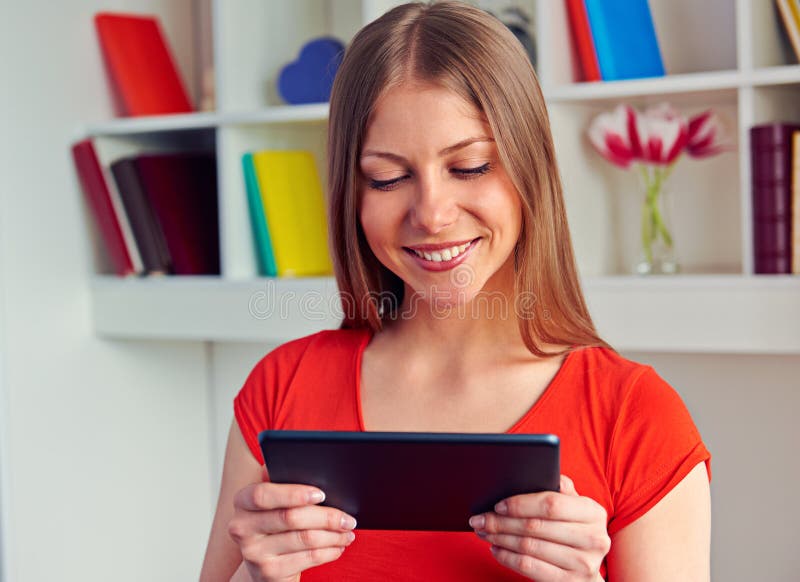 Woman Looking at Tablet Pc and Smiling Stock Image - Image of happiness ...