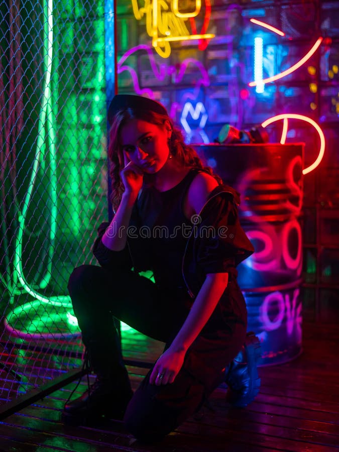 Caucasian Woman Posing in Neon Studio. Stock Photo - Image of iron ...