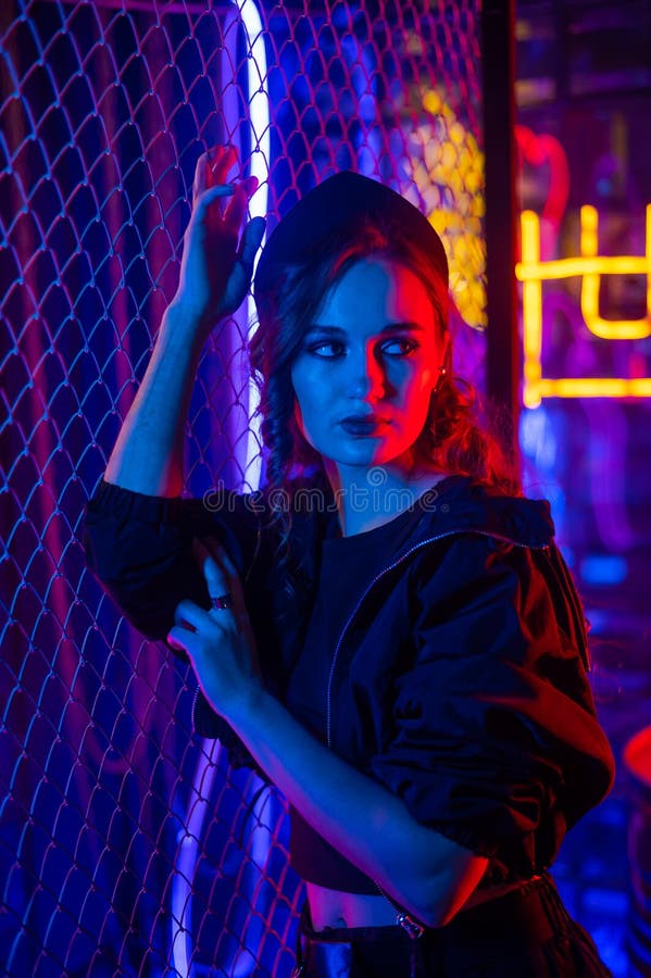 Caucasian Woman Posing in Neon Studio. Stock Photo - Image of makeup ...