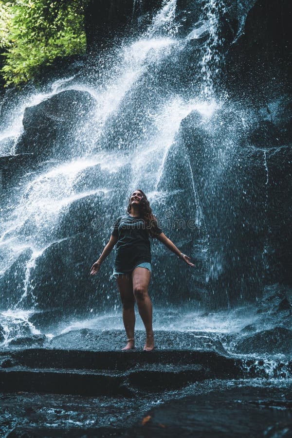 Caucasian Woman Standing in Front of Waterfall Stock Image - Image of ...