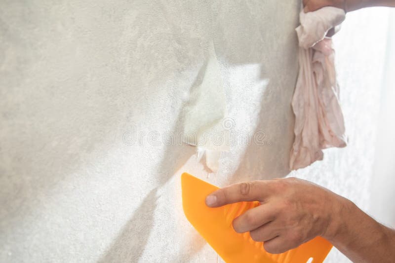 Caucasian Worker Applying Wallpaper To Wall at Home Stock Image - Image ...