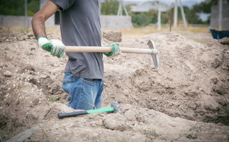 Caucasian Worker Digging a Hole Stock Photo - Image of tool, digging ...
