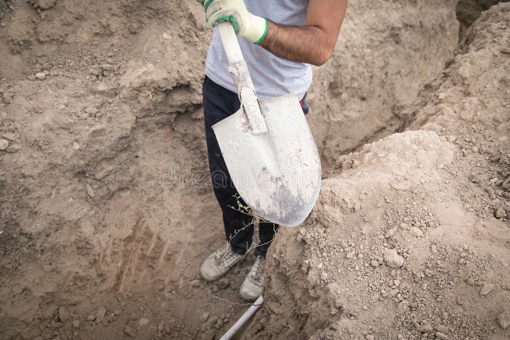 Caucasian Worker Digging a Hole Stock Photo - Image of farmer, worker ...
