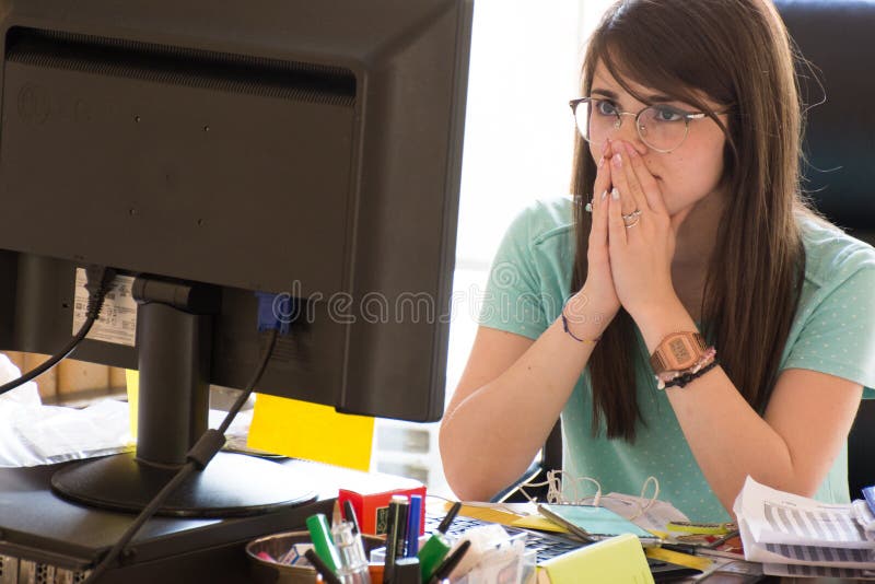 Stressed Woman at Work with Computer in Front of Her Stock Photo ...