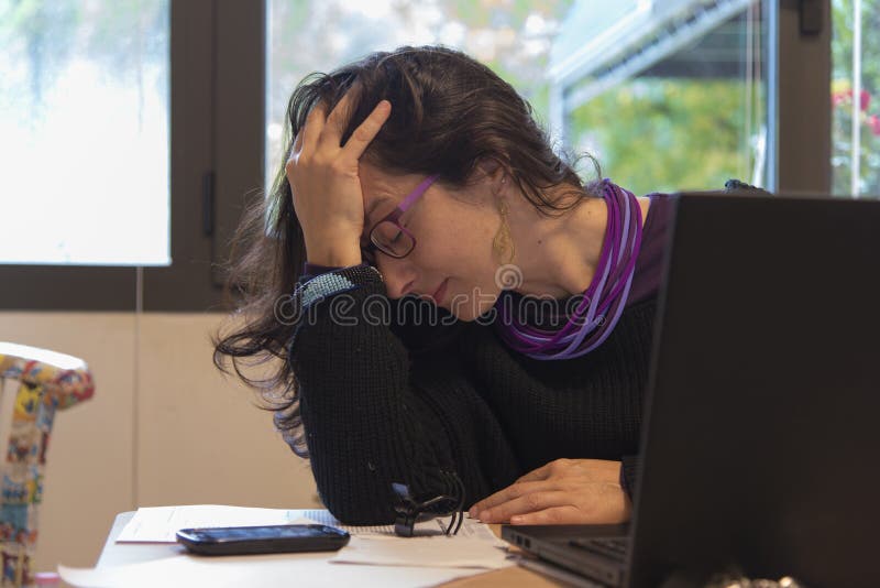 Stressed Woman at Work with Computer in Front of Her Stock Photo ...