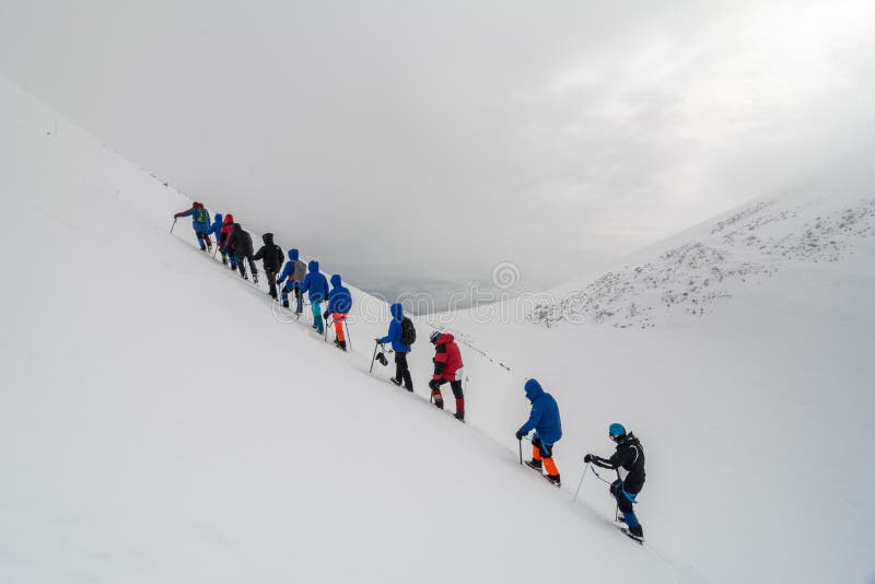 Caucasus / Russia - 07.15.2018 Group of Climbers Climbing Mountain ... Caucasus / Russia - 07.15.2018 Group of Climbers Climbing Mountain ...