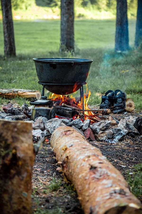 A Cauldron for Cooking is on the Fire Stock Image - Image of summer ...