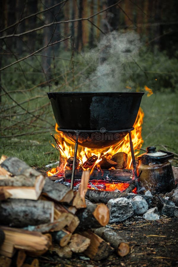 A Cauldron for Cooking is on the Fire Stock Image - Image of heat ...