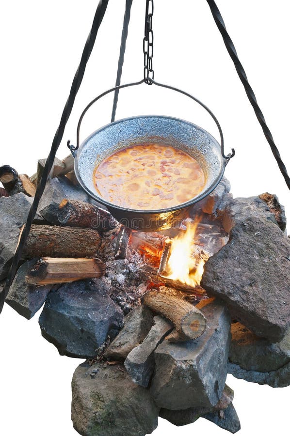 Cauldron cooking over fire stock photo. Image of inside - 46874794