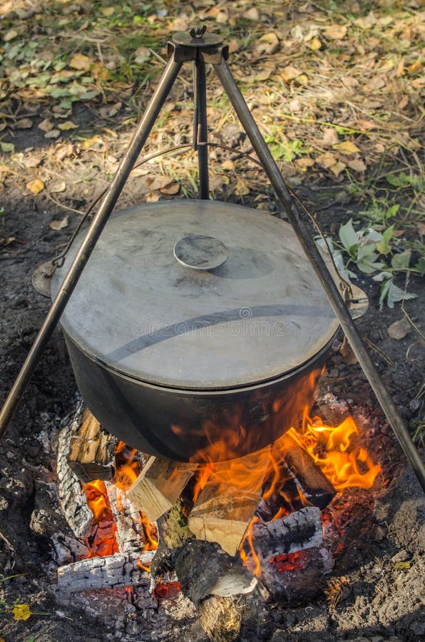 A Cauldron Covered with a Lid in Which Kulesh is Cooked Hangs on a ...