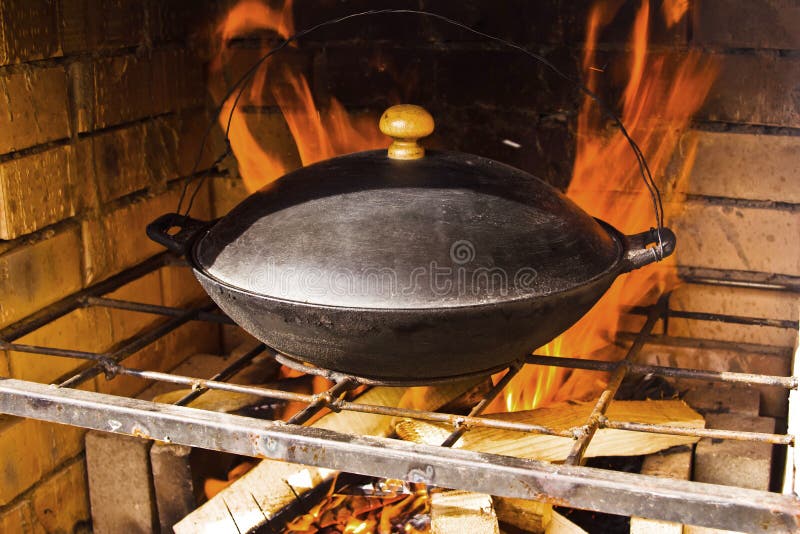 Cauldron on fire stock image. Image of metal, iron, camping - 75364083
