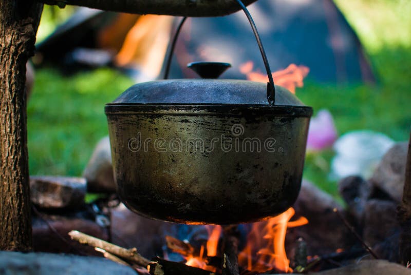 Cauldron on the fire stock photo. Image of high, cloudy - 51887836