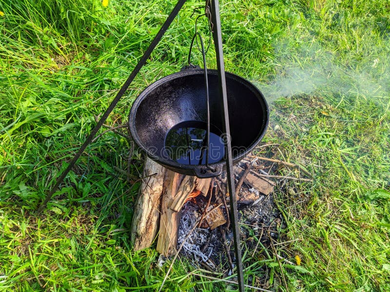 Cauldron in Nature and Open Fire during the Daytime in Summer. Stock ...