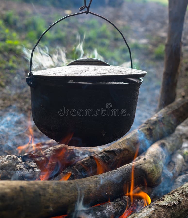 Cauldron on the open fire stock photo. Image of journey - 46866018