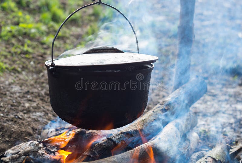 Cauldron on fire stock image. Image of rock, boiling - 29664645