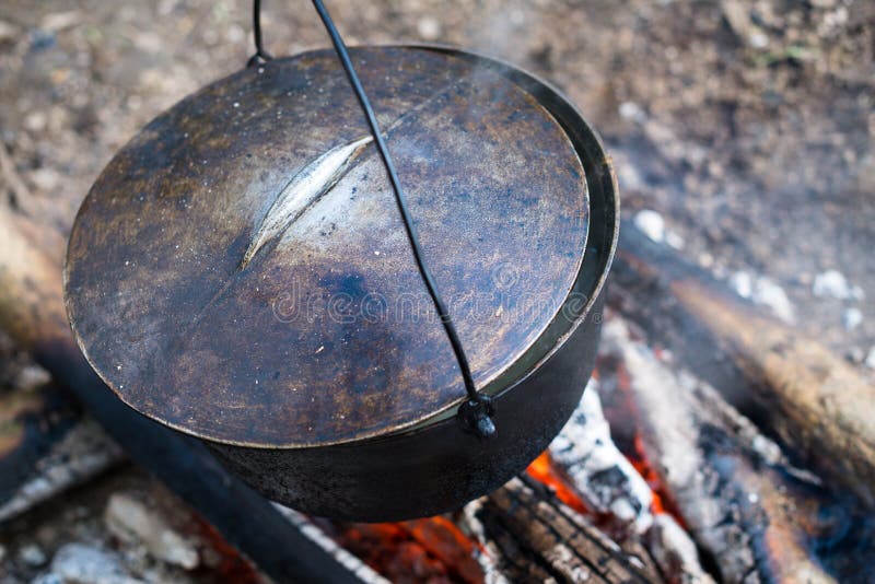 Cauldron on the open fire stock photo. Image of campsite - 46893350
