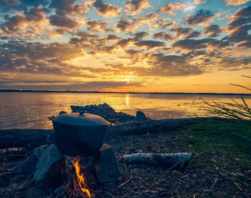 The Cauldron with Tea is Boiled on the Fire. Stock Photo - Image of ...