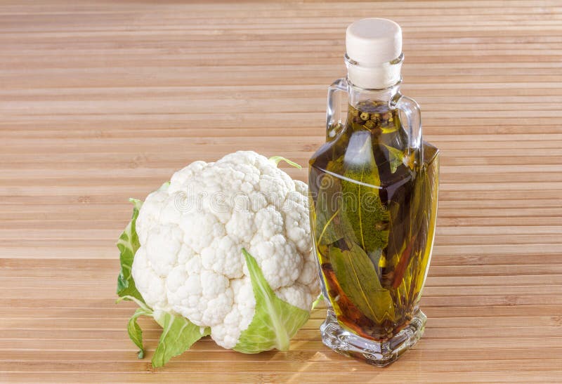 Cauliflower and Bottle of Olive Oil with Spice Stock Image - Image of ...