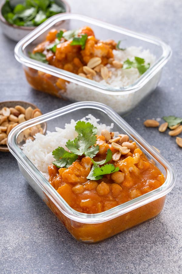 Cauliflower Curry with Peanuts and Cilantro in a Container Stock Photo ...
