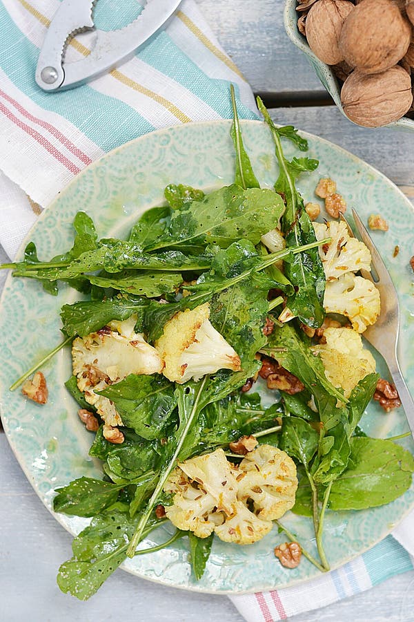 Cauliflower and Ruccola Salad Stock Photo - Image of light, nutritious ...