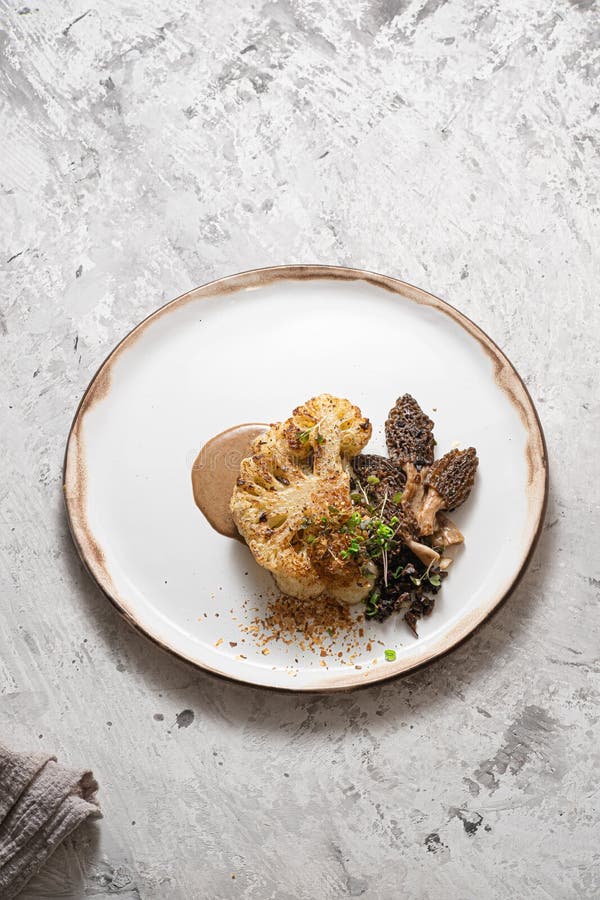 Cauliflower Steak with Morels on Plate, Restaurant Dish, Copy Space ...
