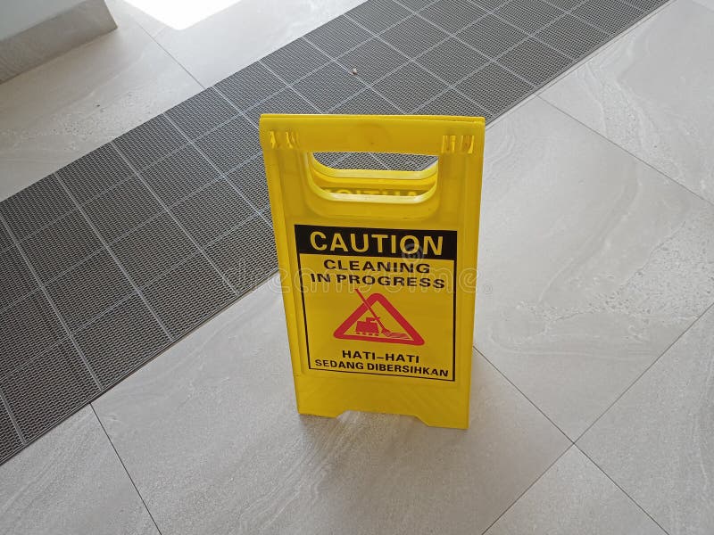 Caution Cleaning in Progress. Cleaning in Progress Sign on Yellow ...