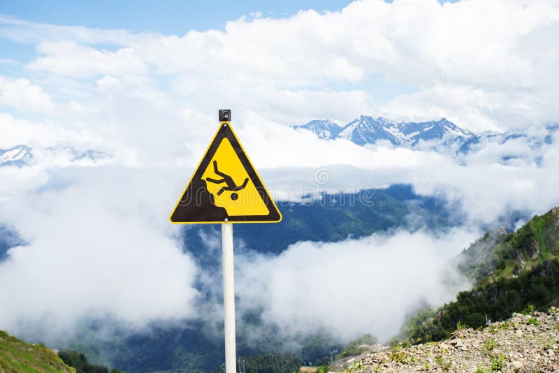 Caution Cliff Sign in the Mountains Stock Image - Image of caution ...