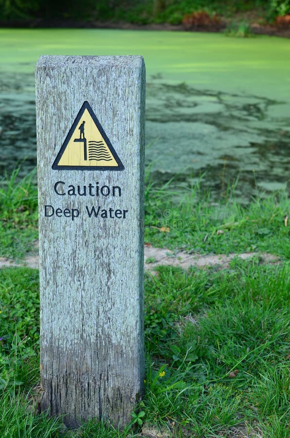 Deep Water Danger Sign on Waters Edge. Stock Photo - Image of sign ...