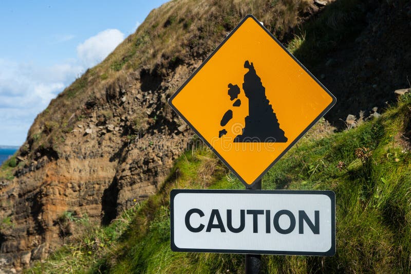 Caution, Falling Rocks Sign Stock Photo - Image of sign, beware: 59456668