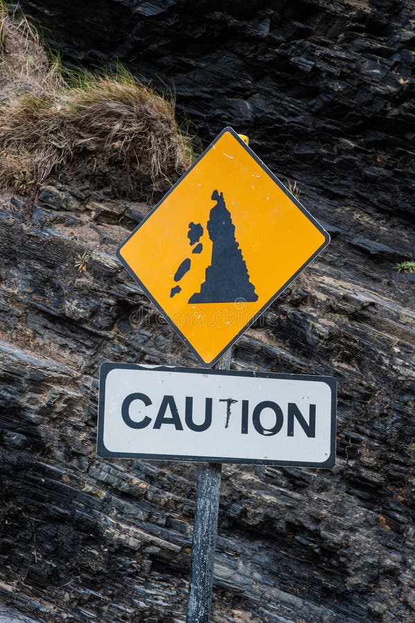 Caution falling rocks sign stock photo. Image of danger - 59482084