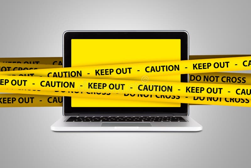 Caution and Keep Out Tapes on Laptop with Blank Screen Stock ...