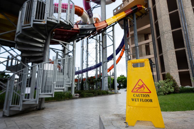 Caution Sign in Aqua Park. Caution Wet Floor Sign Stock Photo - Image ...