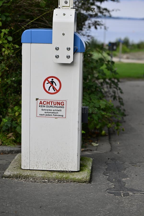 Caution Sign on Barrier Control Box Stock Image - Image of person, wall ...