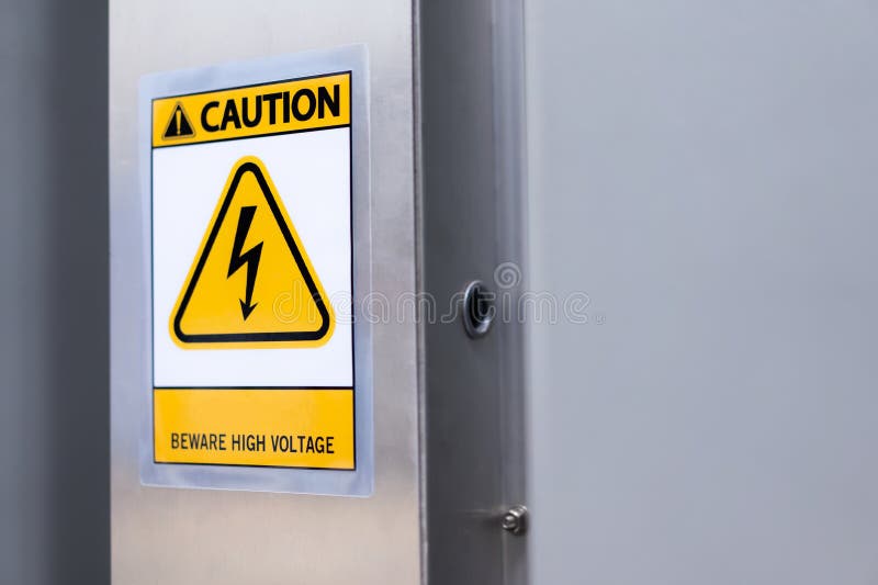 Caution Sign: Beware of High Voltage on the Wall of the Building ...