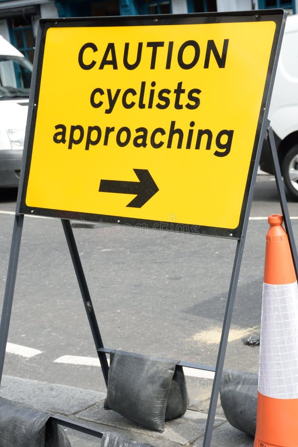 Beware of Cyclists Road Safety Sign Against Blue Sky Stock Photo ...