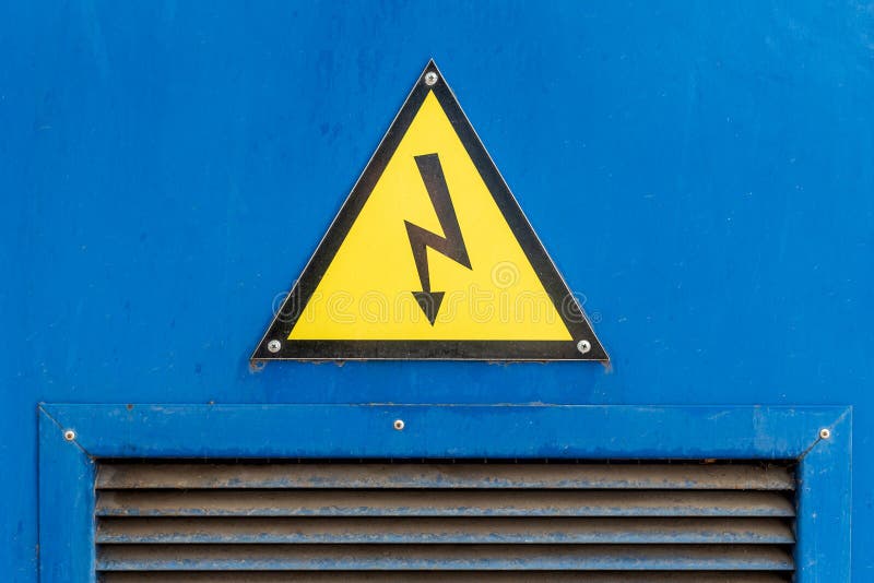 A Caution Sign for Electrical Voltage on an Old Electrical Panel. Stock ...
