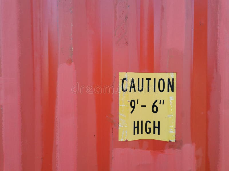 Caution Sign on Light Brown Metal Container Surface. Stock Photo ...