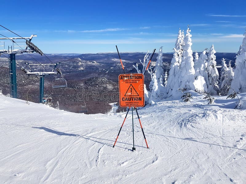 Caution Sign and Warning on a Ski Resort Stock Photo - Image of tree ...