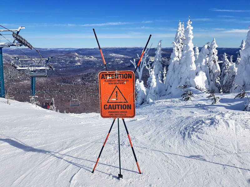Caution Sign and Warning on a Ski Resort Stock Image - Image of tree ...