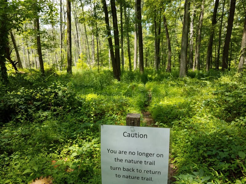Caution Sign You are No Longer on the Trail in Forest or Woods Stock ...