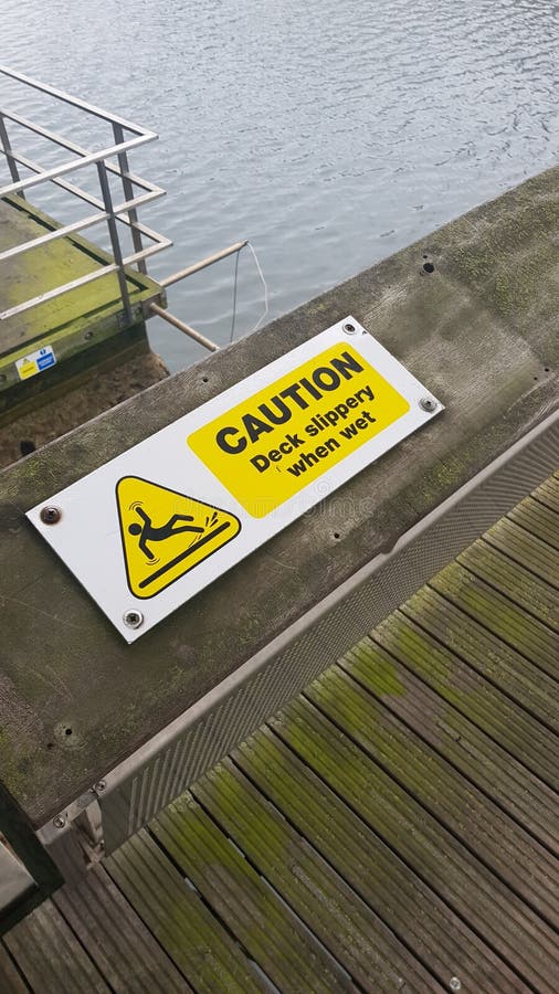 Caution Slippery Deck when Wet Sign. Stock Photo - Image of fall ...