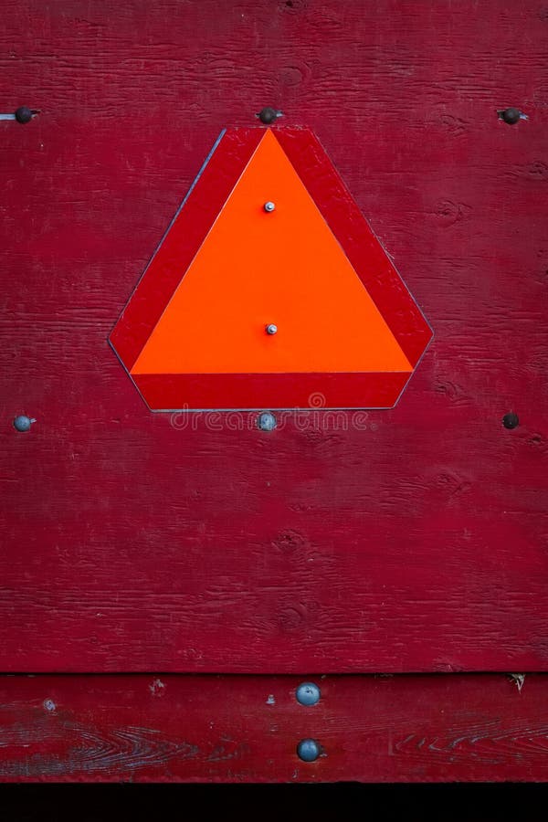 Caution Slow-moving Vehicle Stock Image - Image of wood, orange: 101209131