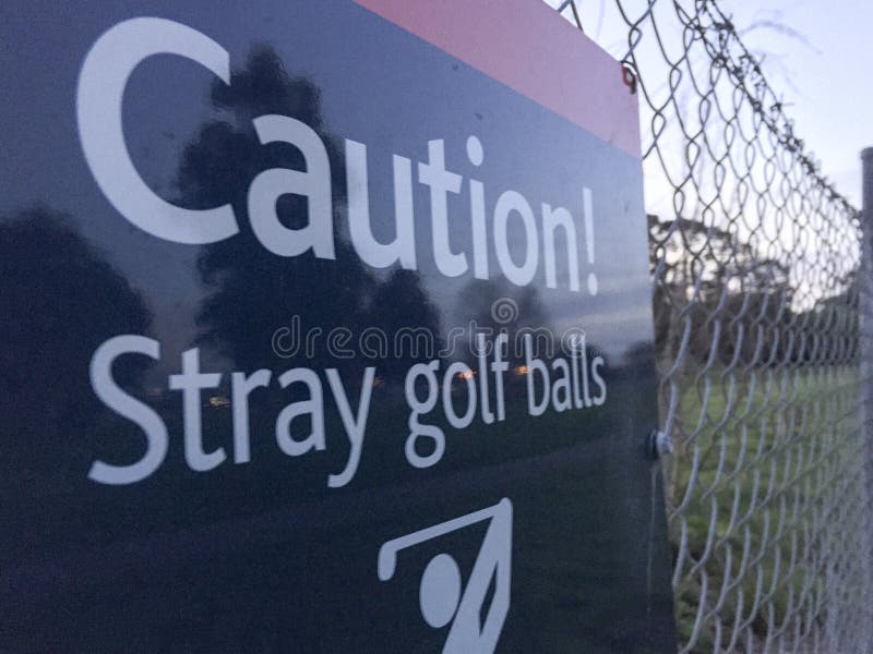 Caution Stray Golf Balls Landscape Stock Photo - Image of golf, fence ...